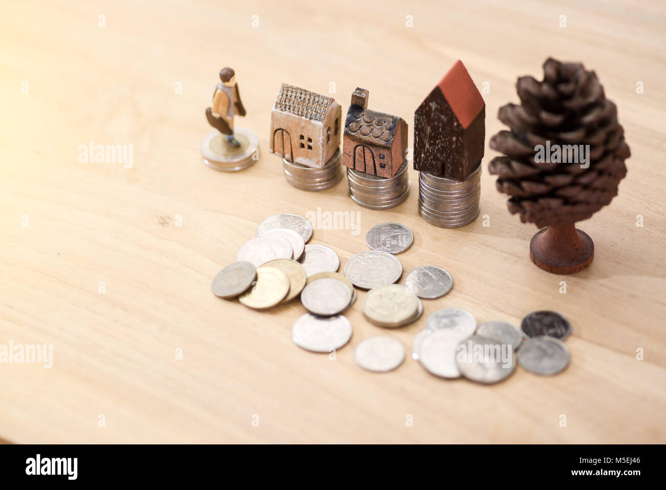 Mortgage concept. Money and house Stock Photo - Alamy