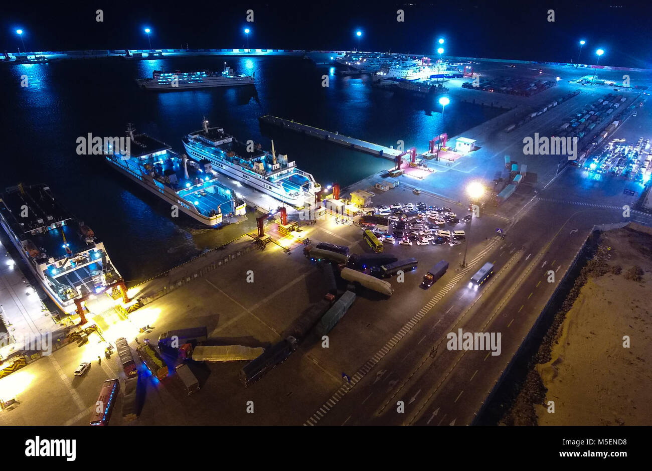 Haikou, China's Hainan Province. 22nd Feb, 2018. Vehicles wait for ...