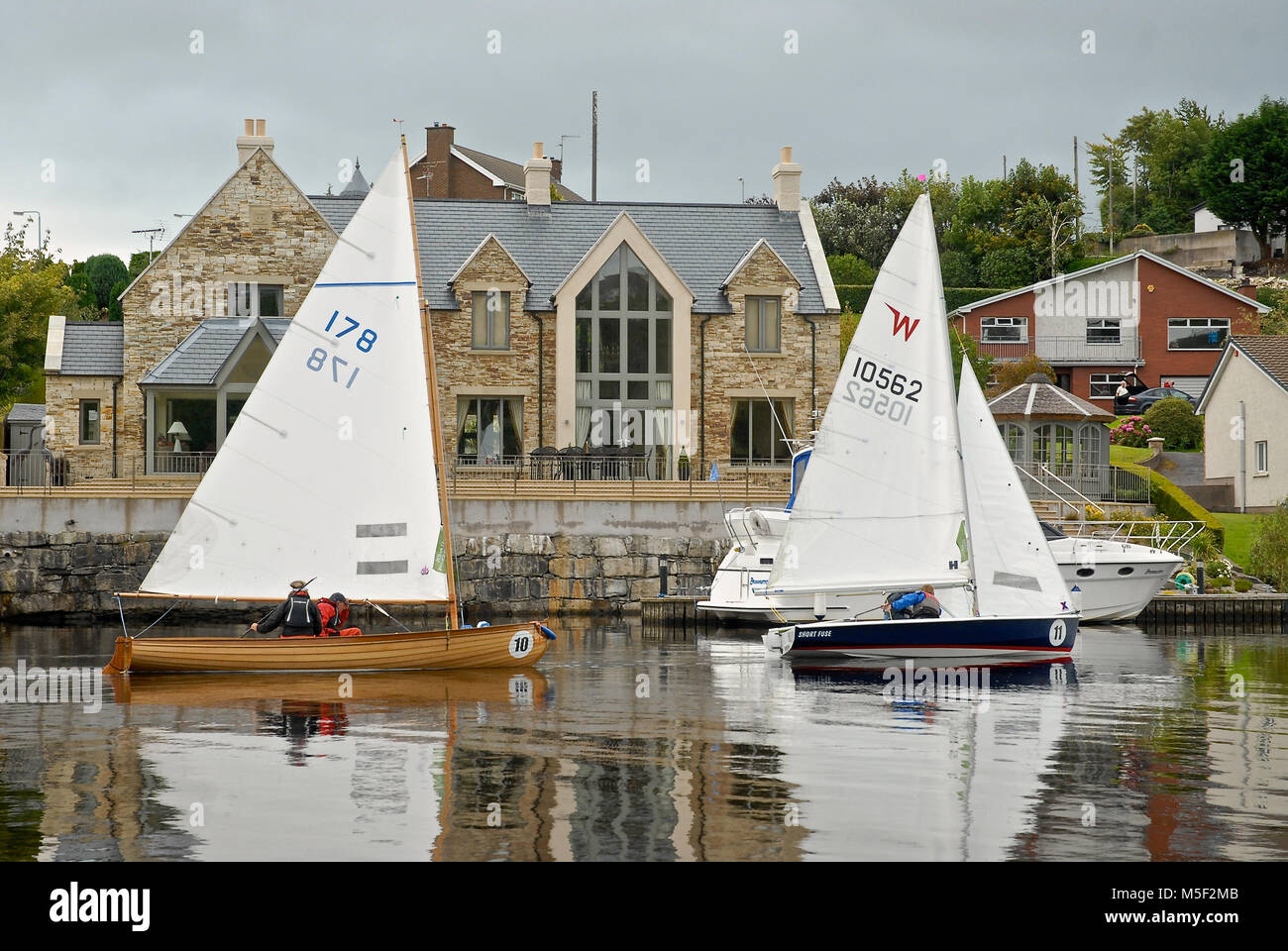 A Shannon One Design built and a Wayfarer ghosts on Lough Erne during ...