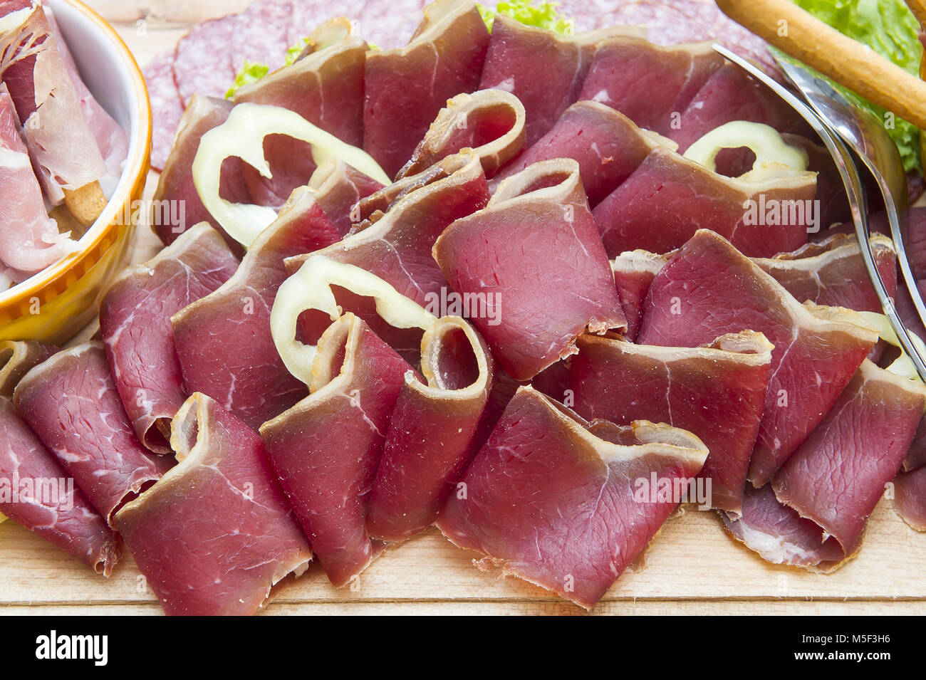 Italian ham prosciutto and salami Stock Photo - Alamy
