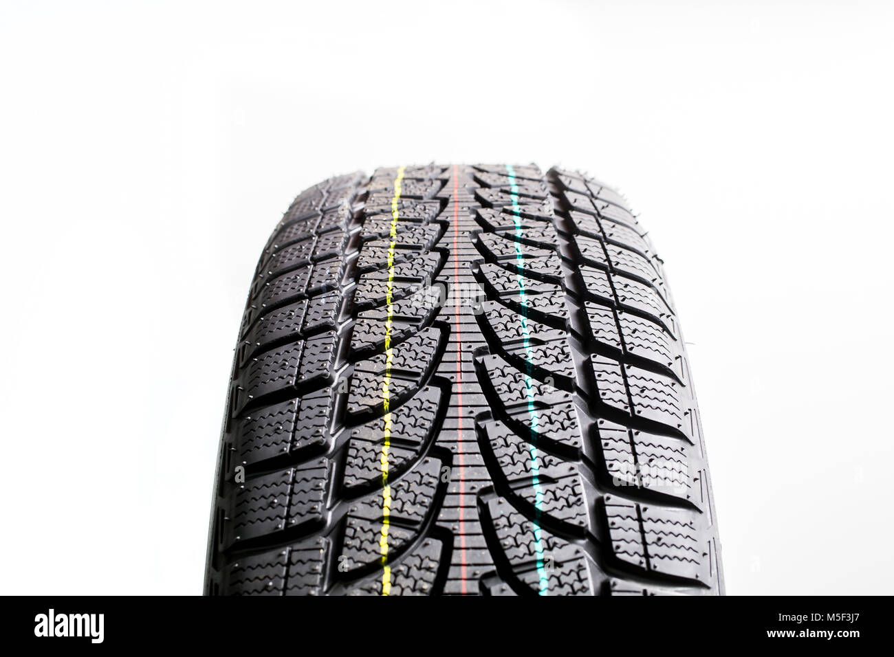 automobile wheel new black tyre for winter car driving isolated on ...