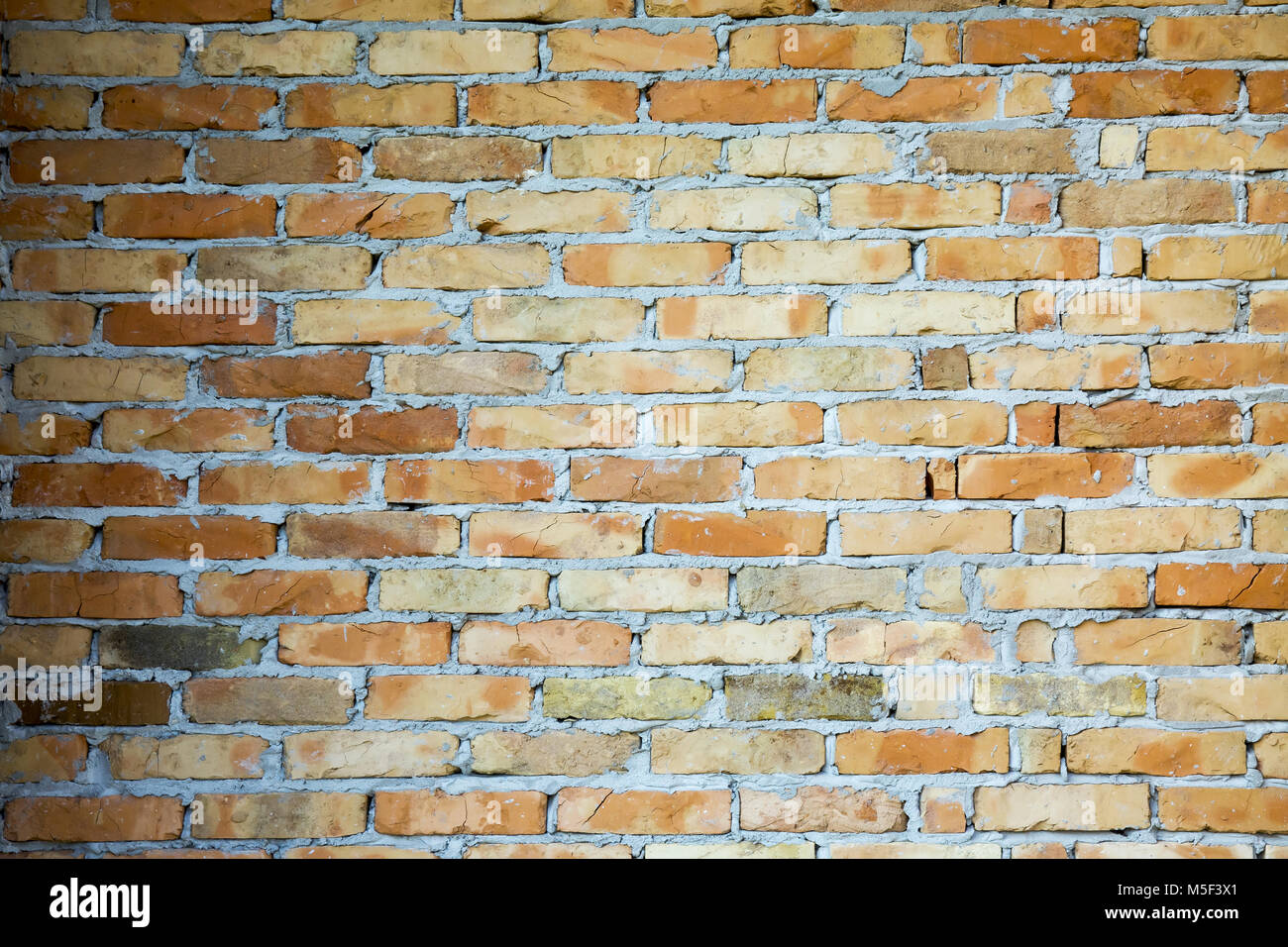 Old brick wall in a background image Stock Photo - Alamy