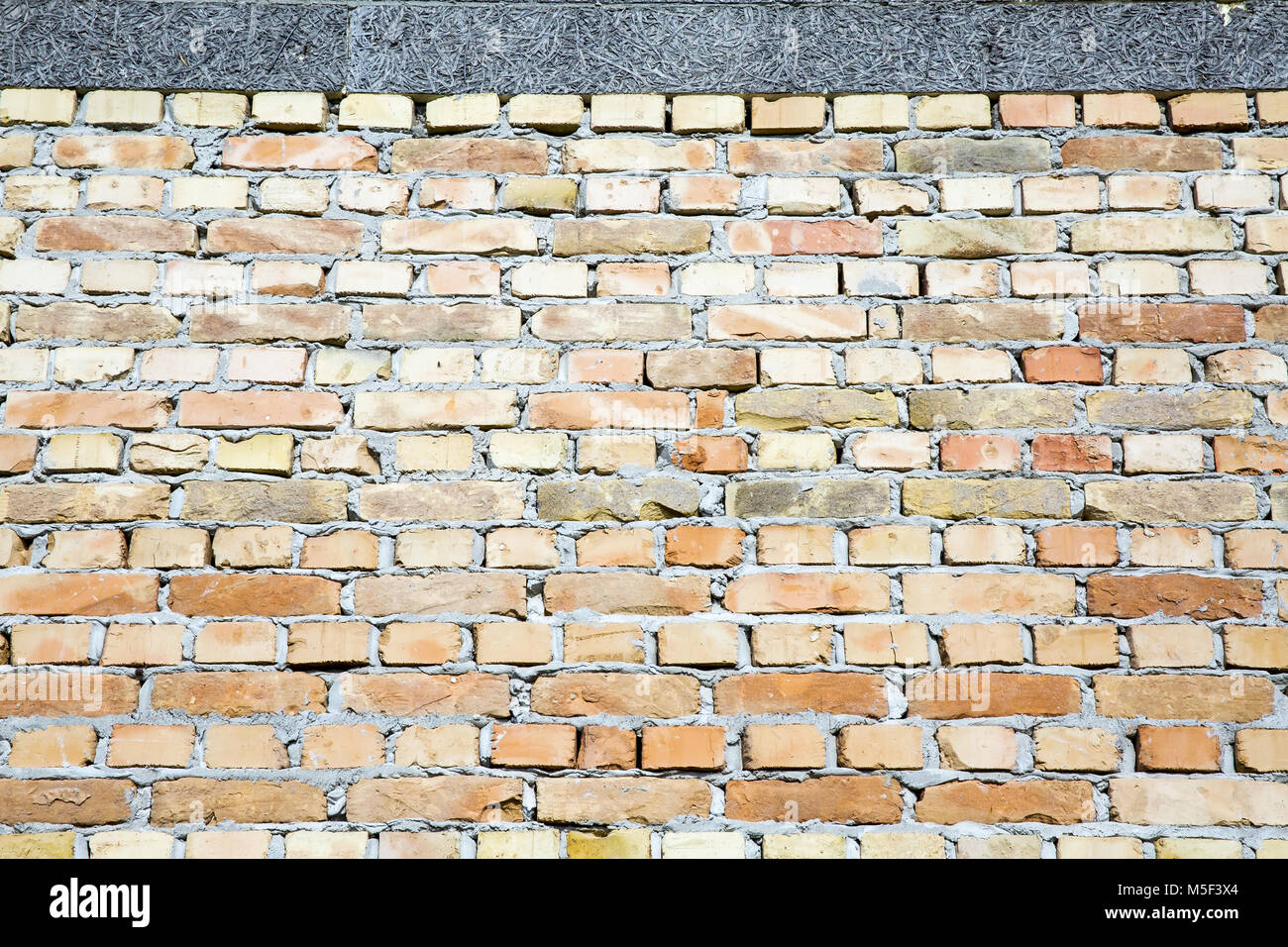 Old brick wall in a background image Stock Photo - Alamy
