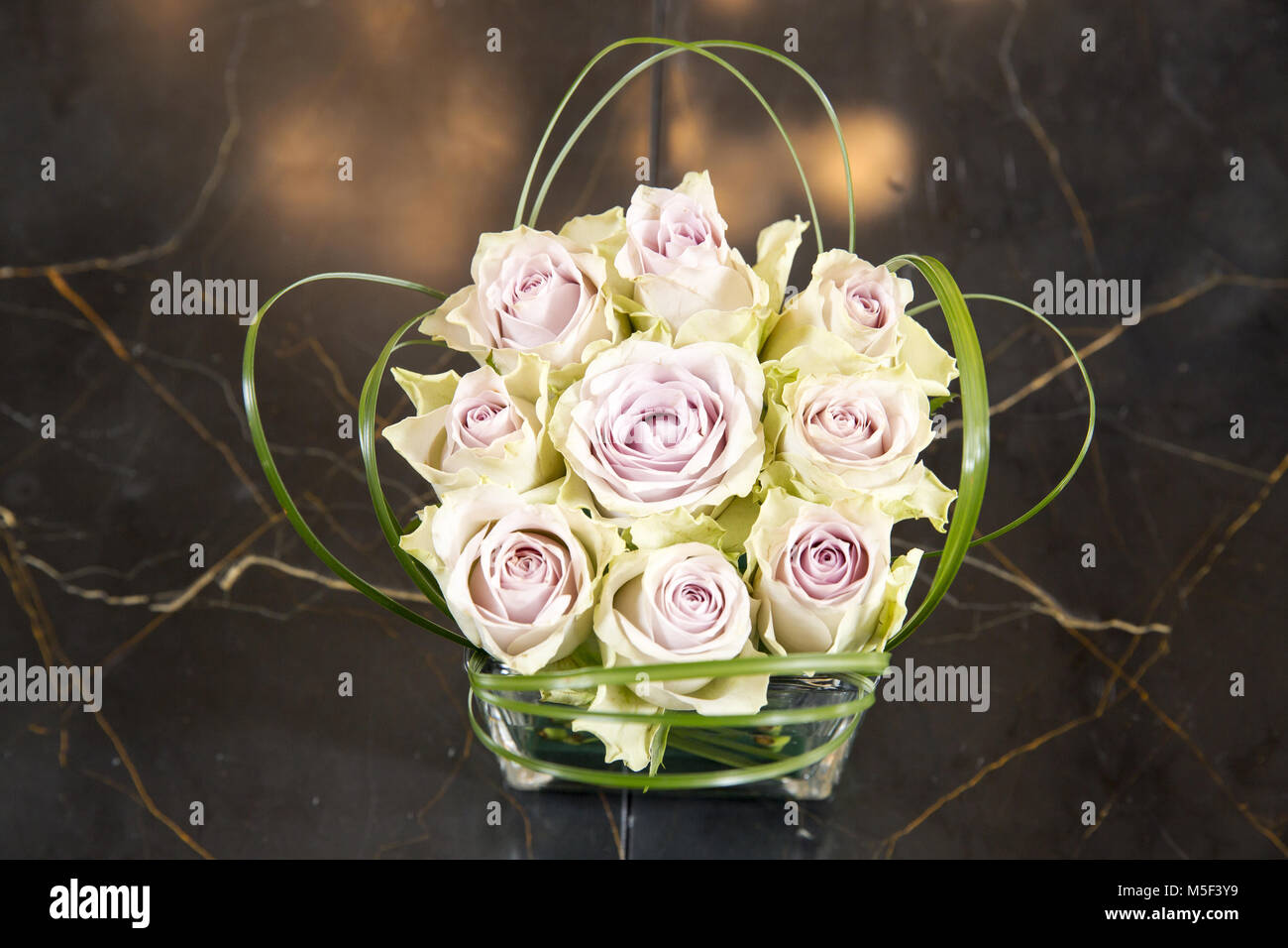 beautiful bouquet of roses in basket Stock Photo - Alamy