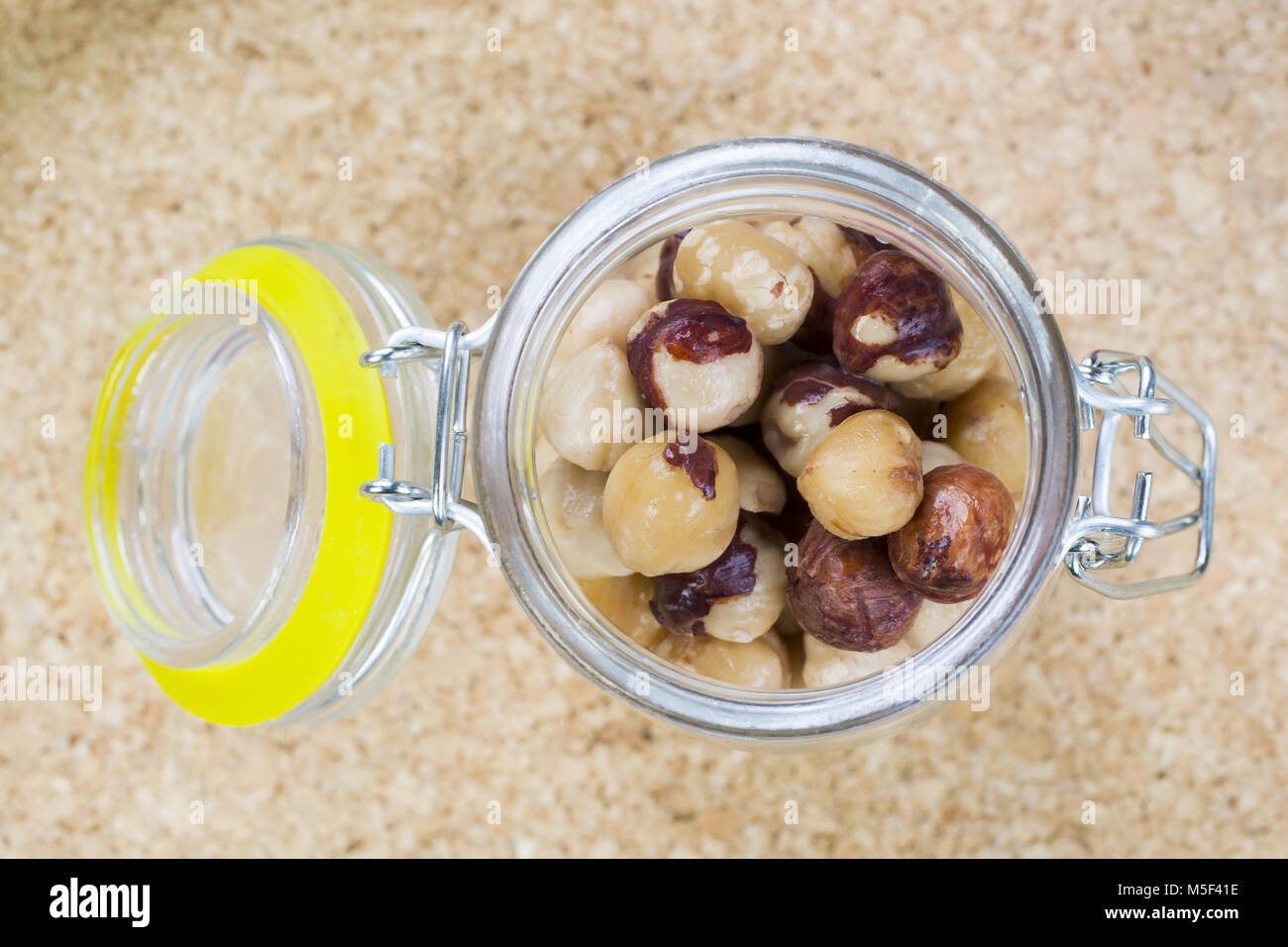 cleaned hazelnuts in a jar Stock Photo - Alamy