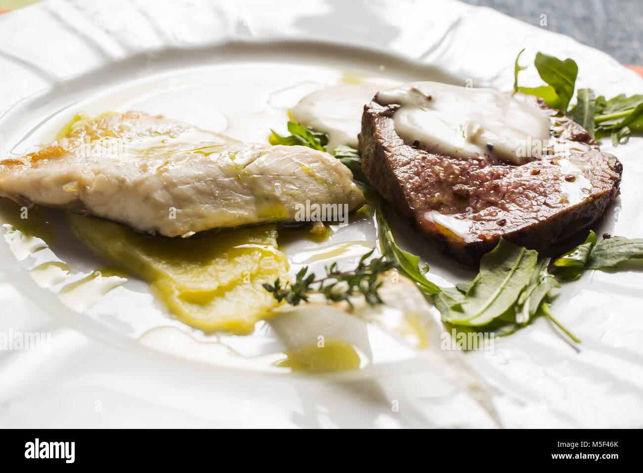 beef meat and fish in a plate Stock Photo - Alamy