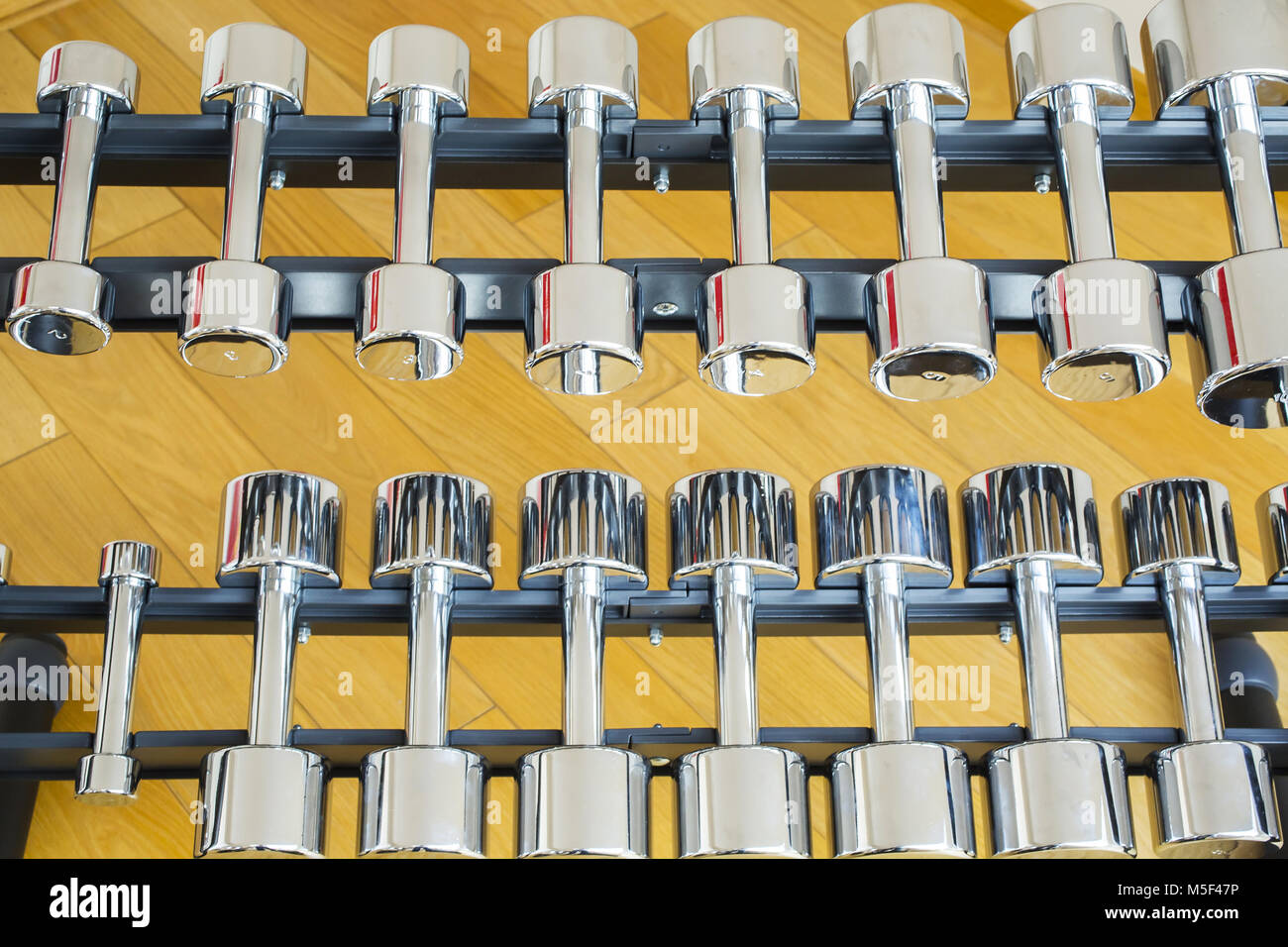Dumbbell rack silver black hi-res stock photography and images - Alamy