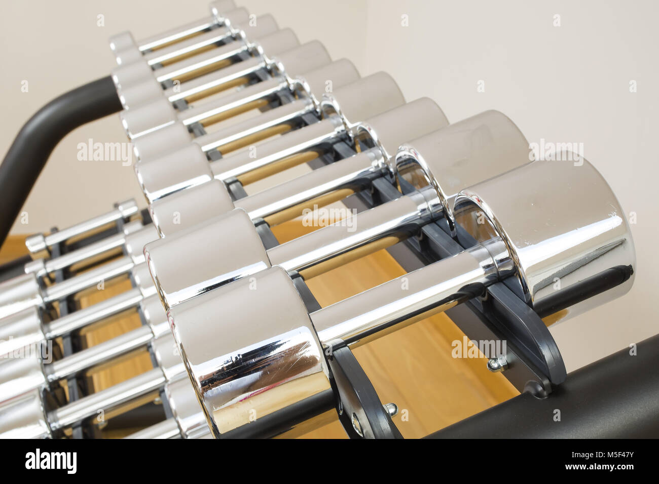 Dumbbell rack silver black hi-res stock photography and images - Alamy