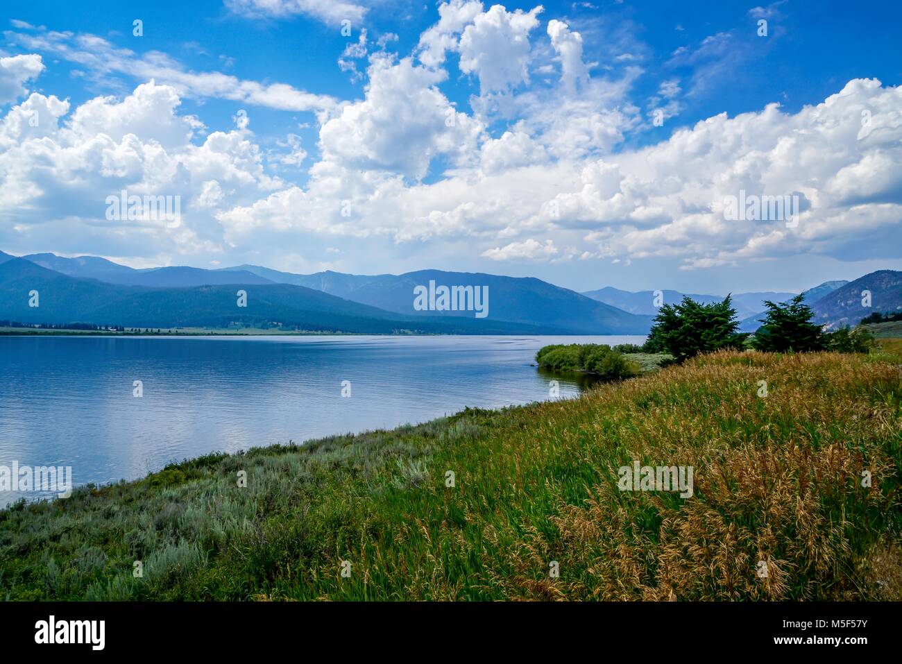 The stunning Jackson Lake in Yellowstone National Park with boaters and ...
