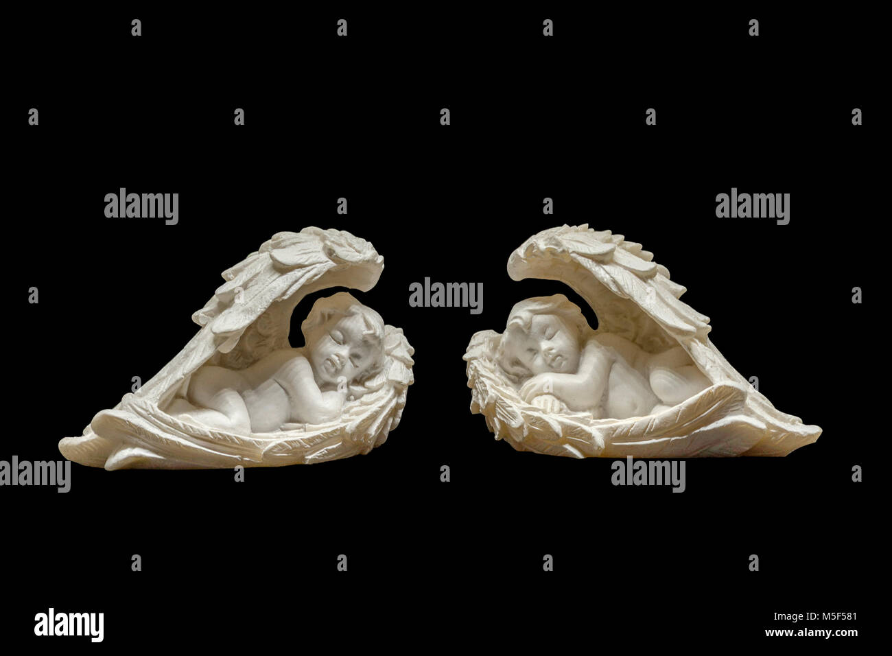 two little angels are sleeping inside their wings Stock Photo - Alamy