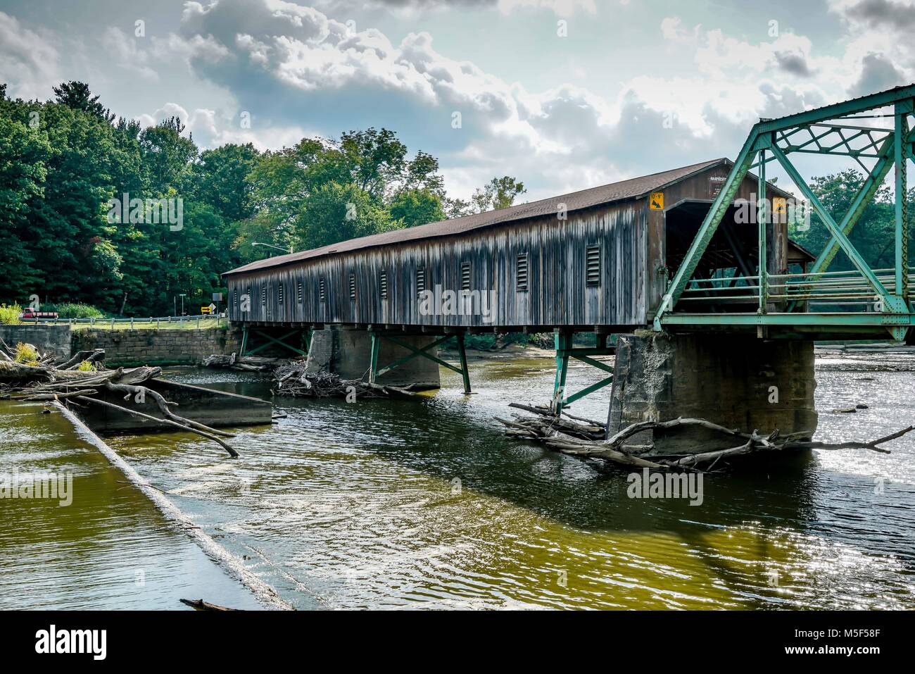 This is Harpersfield Covered Bridge that spans the Grand River in ...
