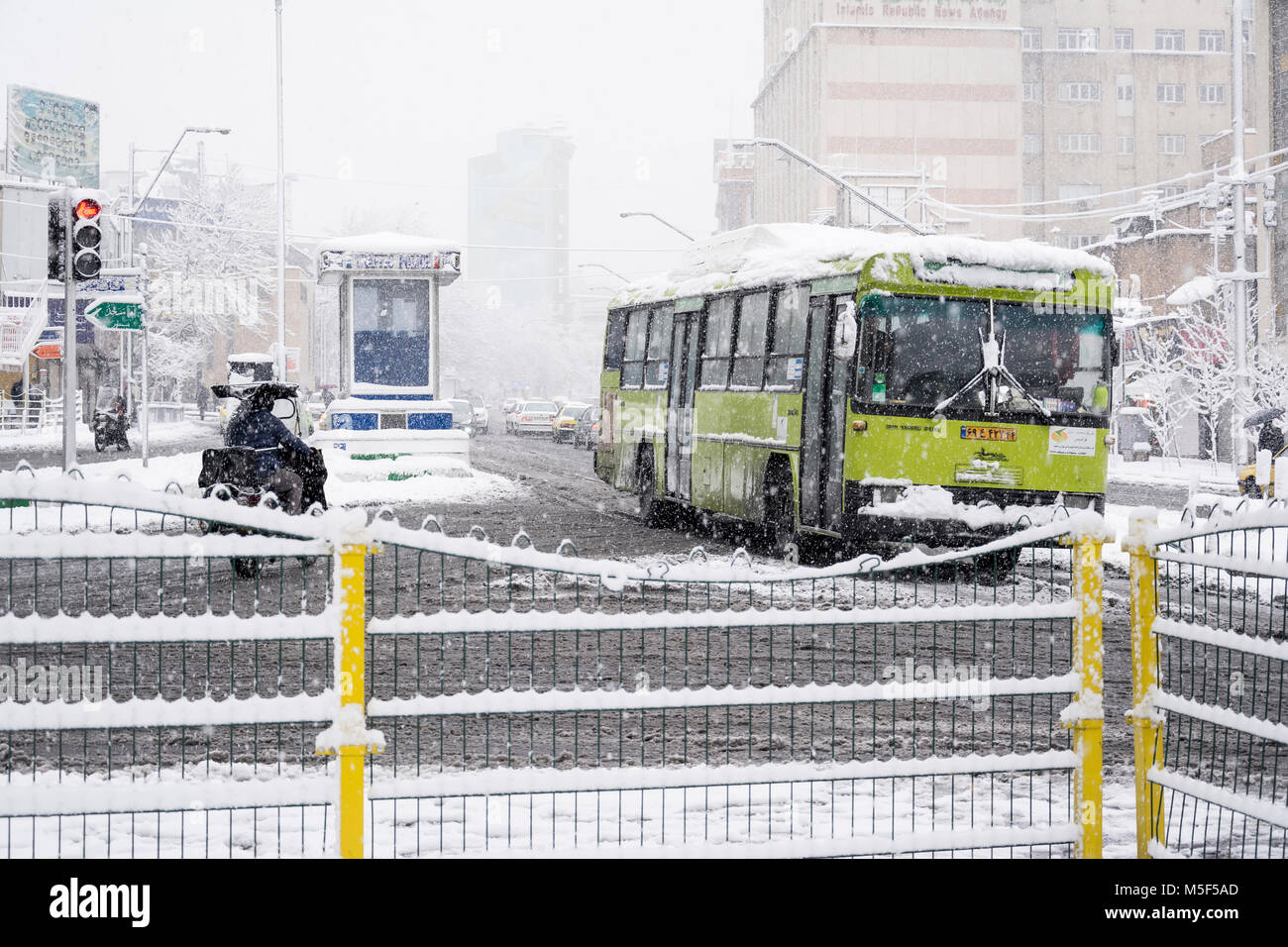 Vali-asr street Tehran, IRAN - January 28, 2018 bus moving through ...