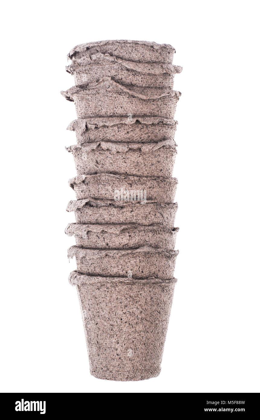 Peat pots for spring seedlings on white background. Studio Photo Stock ...