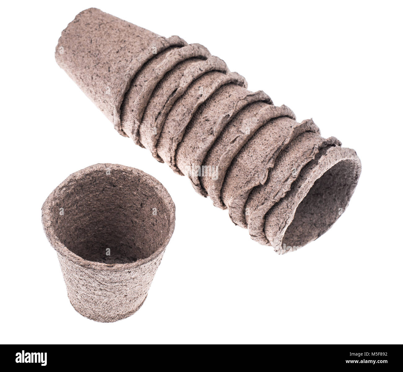Peat pots for spring seedlings on white background. Studio Photo Stock ...