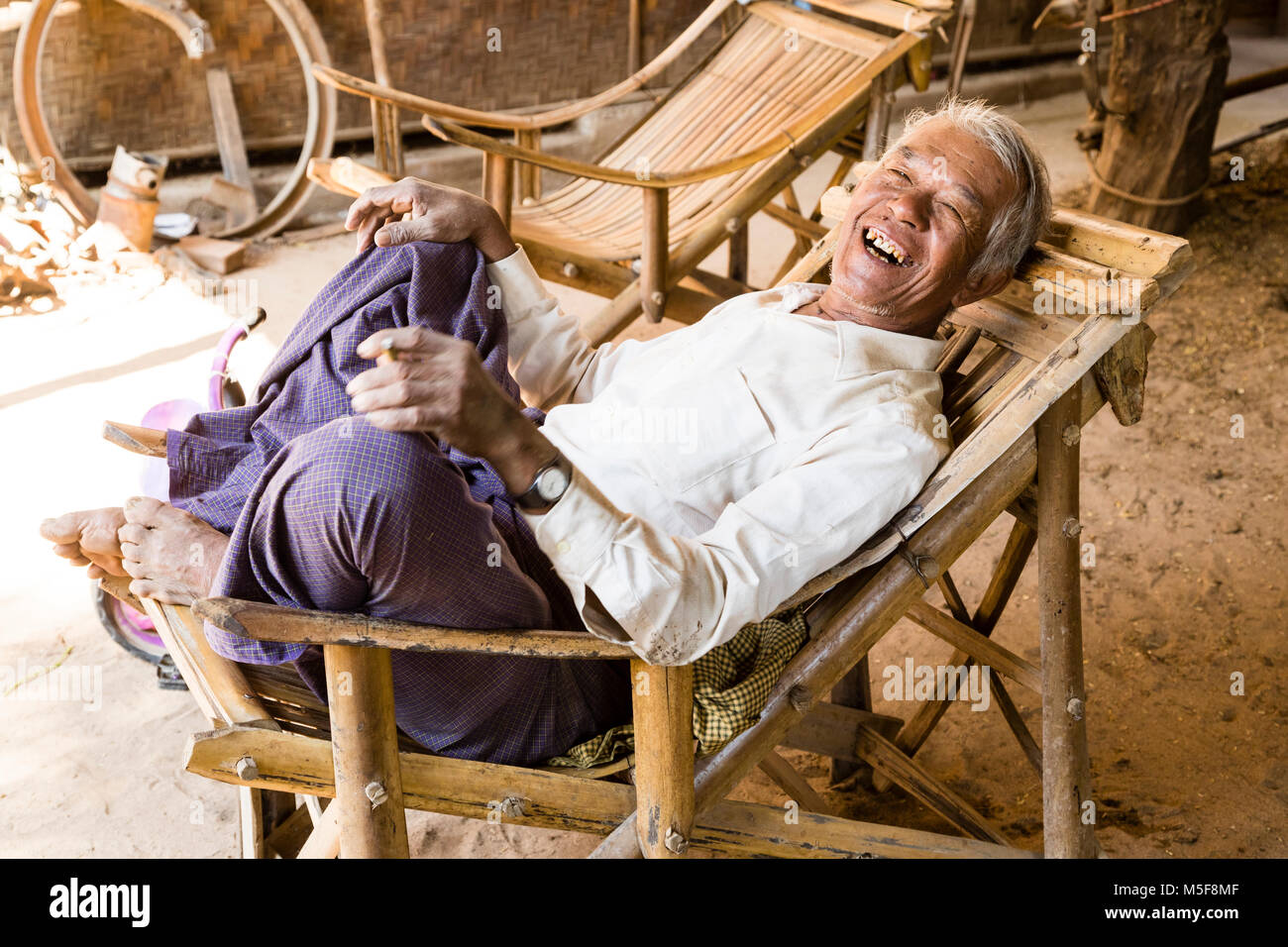 Smiling face of a burmese man hi-res stock photography and images - Alamy