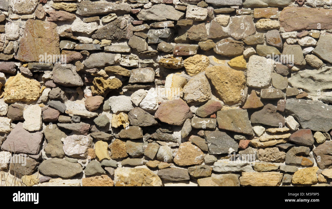 Old Colorfull Stone Wall on Sunny Day Stock Photo - Alamy