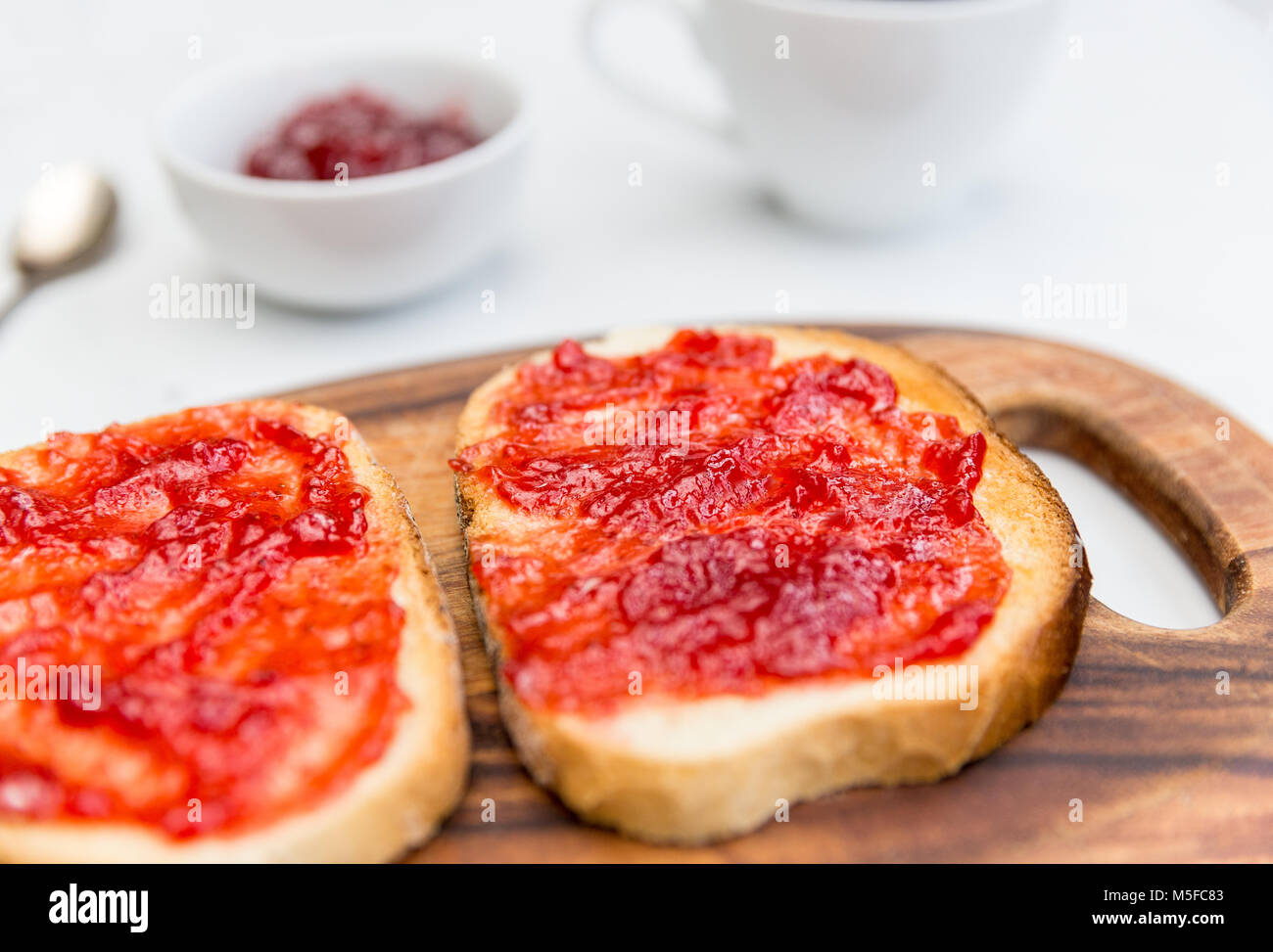 Jam on toast white bowl hi-res stock photography and images - Alamy