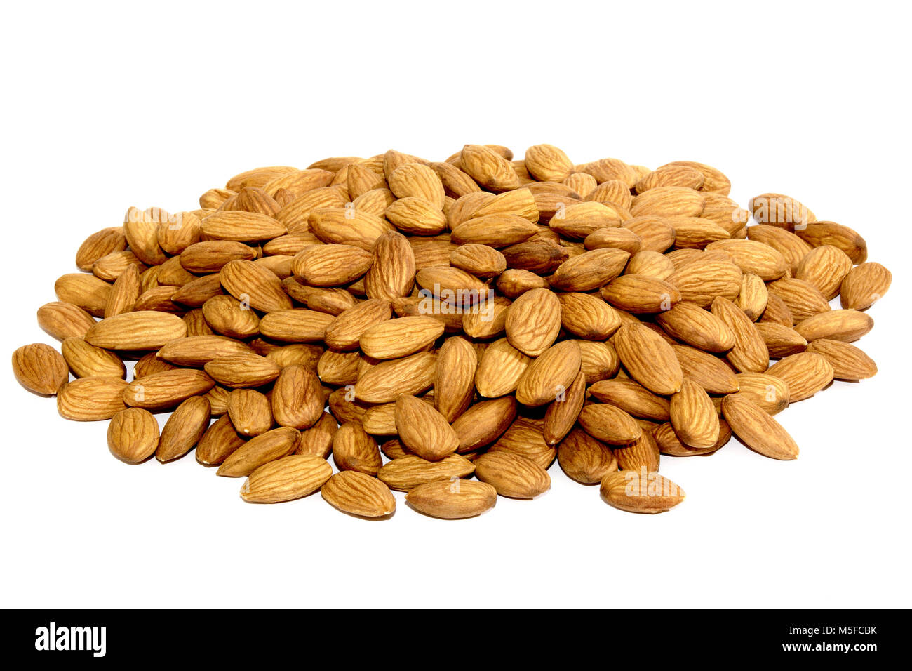 A mound of shelled almonds Stock Photo - Alamy