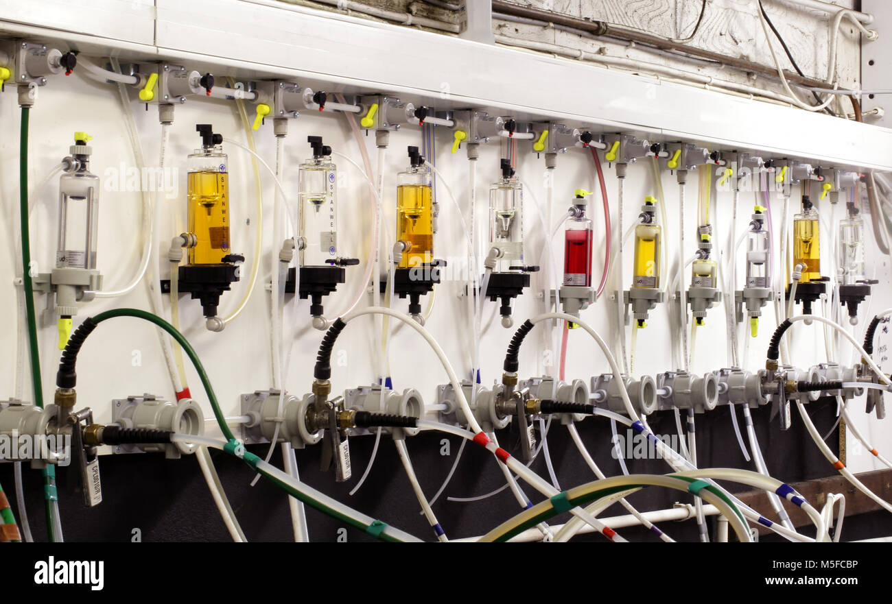 Cellar buoys, also know as fob detectors, mounted on wall of bar cellar ...