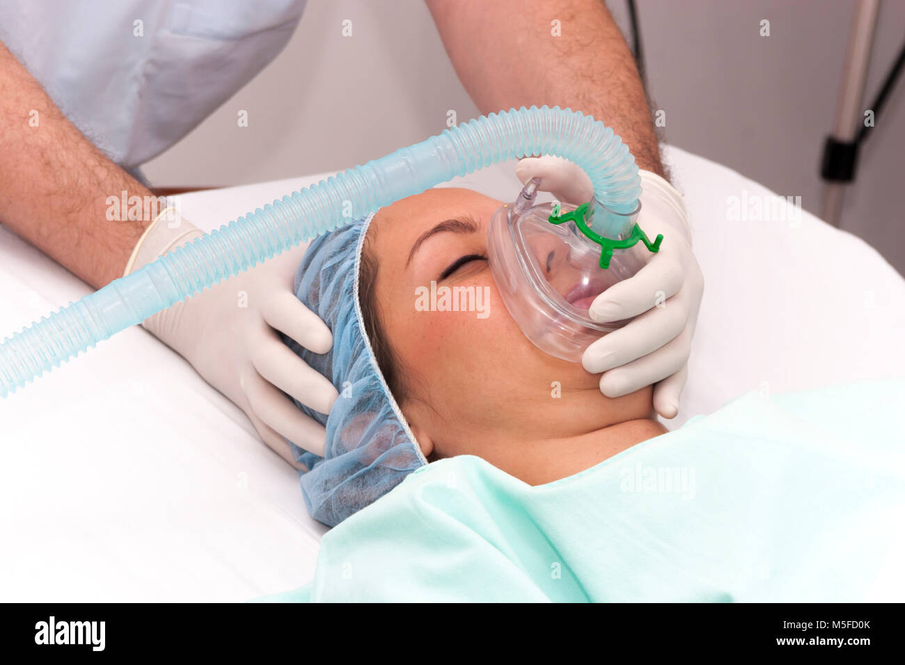 Beautiful patient receives anaesthetic in hospital Stock Photo - Alamy