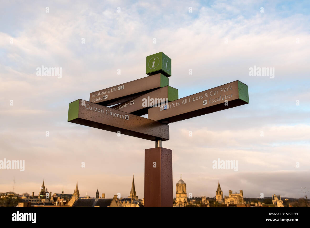 Sign Post With Oxford Spires Behind - Westgate Shopping Centre Roof ...