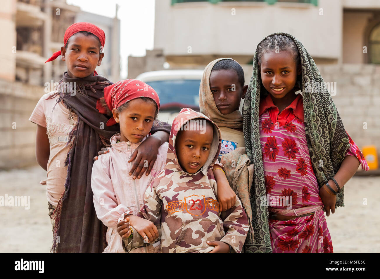 Street kids posing for a photo Stock Photo - Alamy