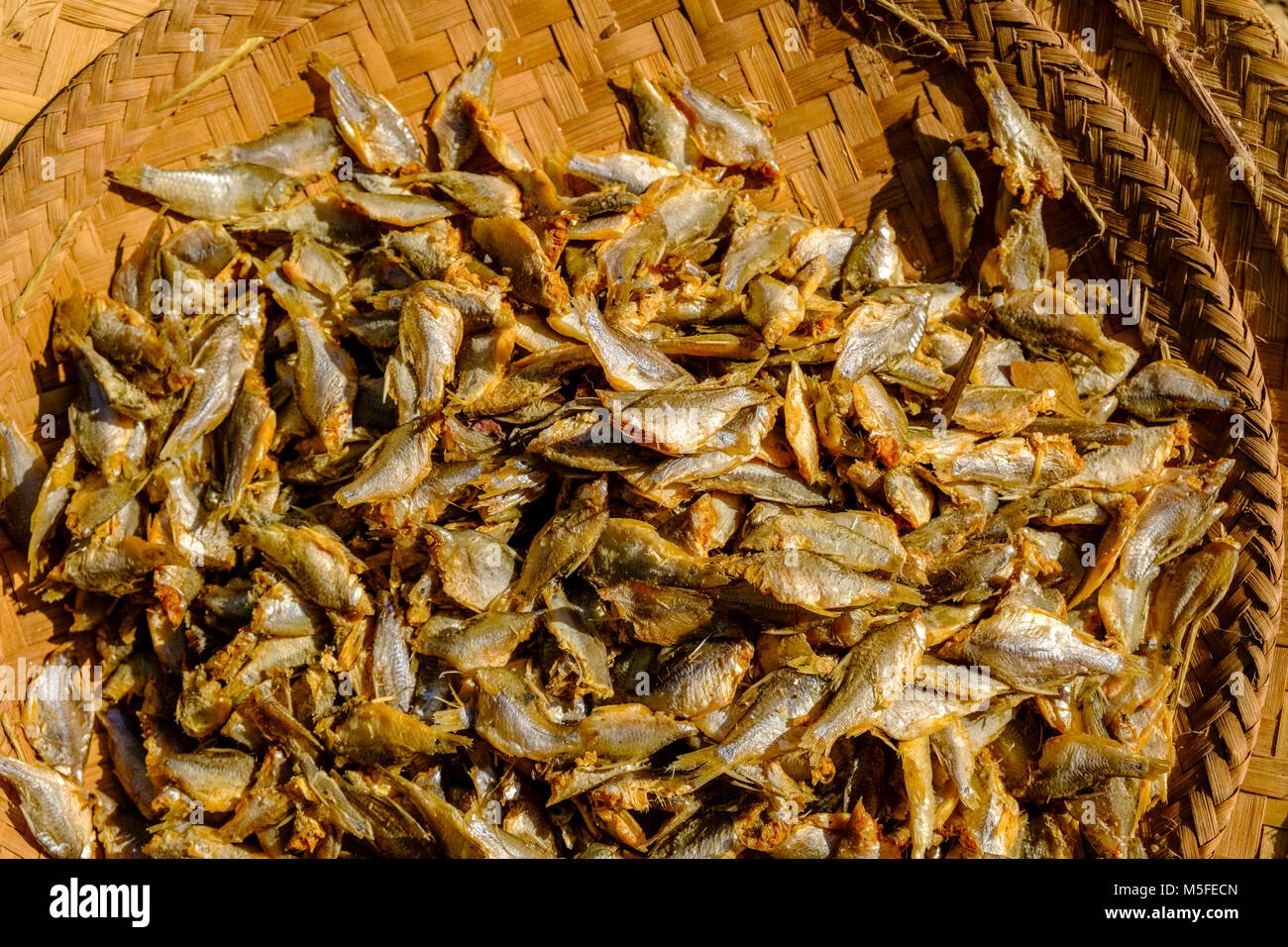 Basket of dried fish hi-res stock photography and images - Alamy