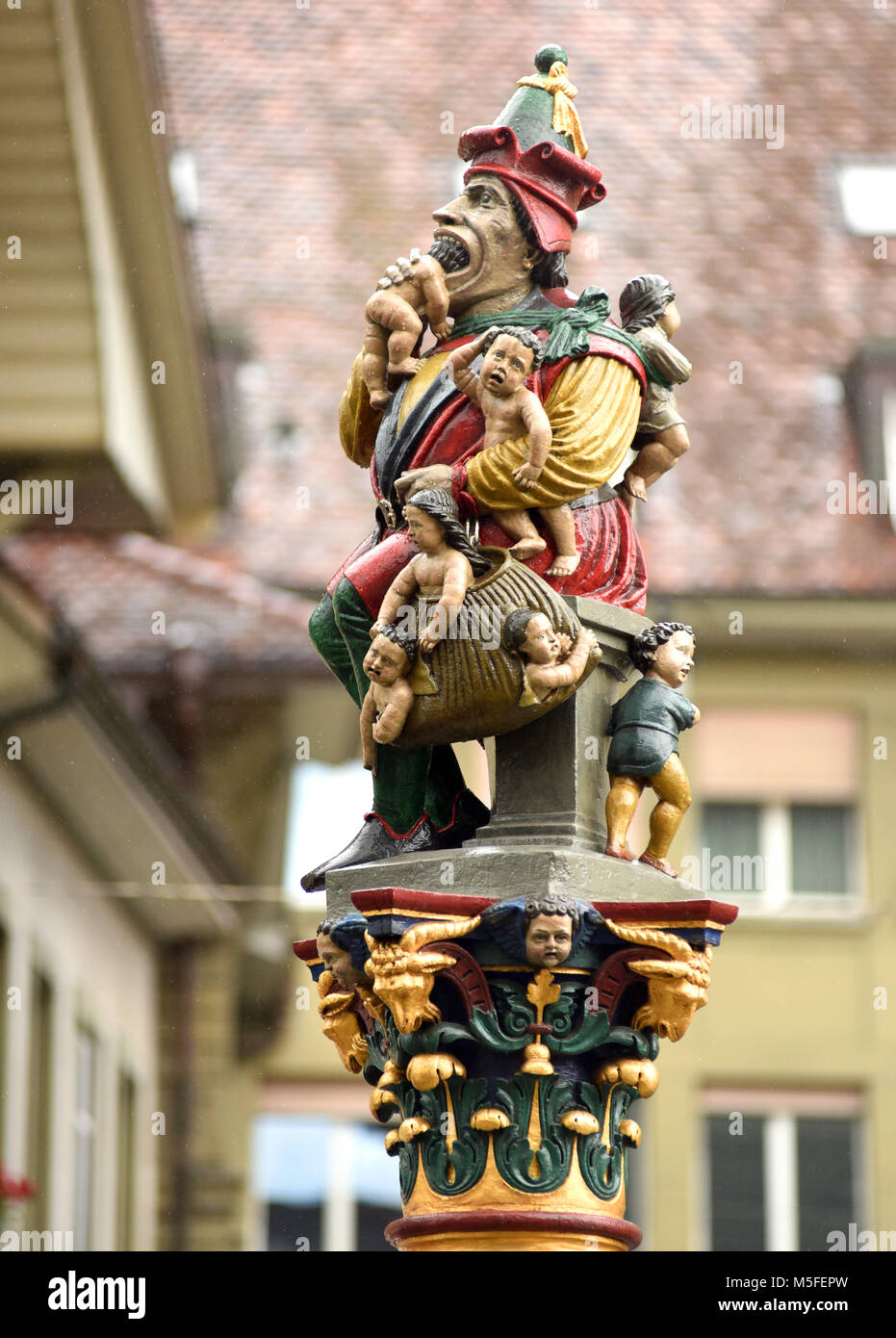 Famous fountain and statue of ogre eating small children in Berne ...