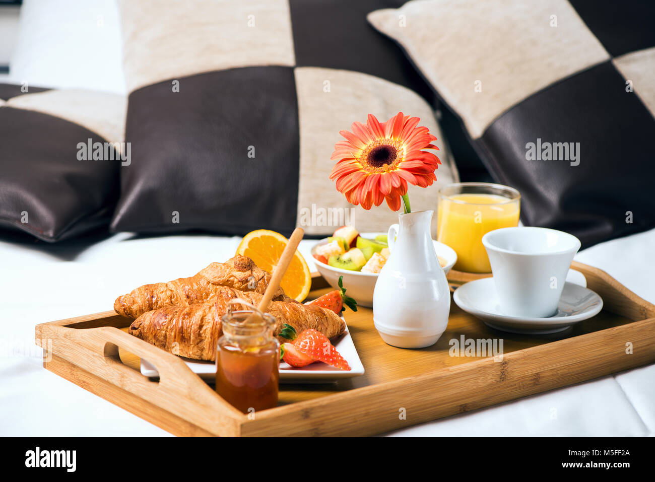 Tray with breakfast food on the bed inside a bedroom Stock Photo - Alamy
