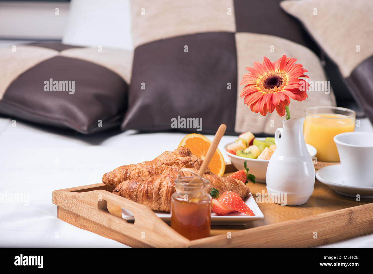 Tray with breakfast food on the bed inside a bedroom Stock Photo - Alamy