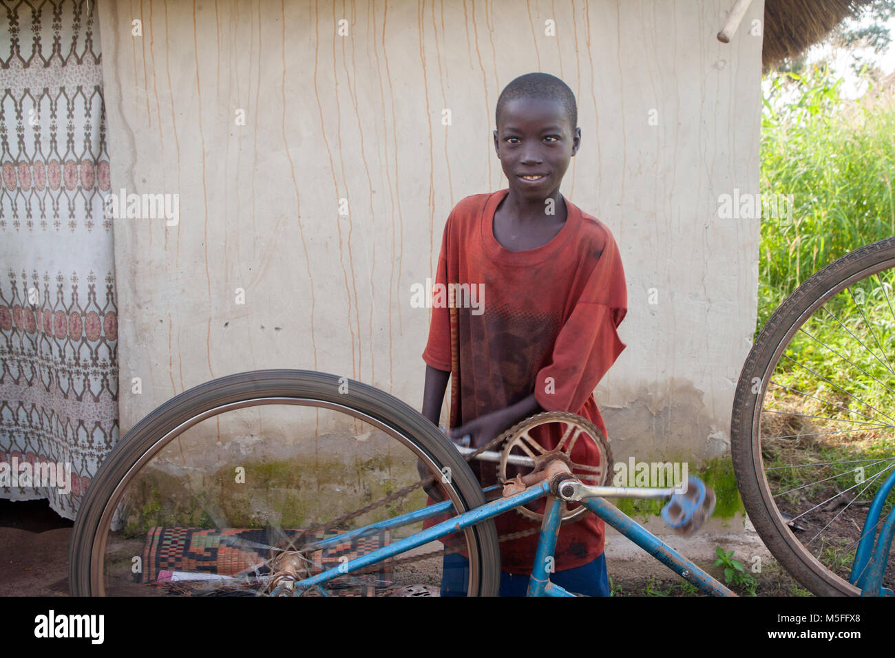 African boy with crooked eye hi-res stock photography and images - Alamy