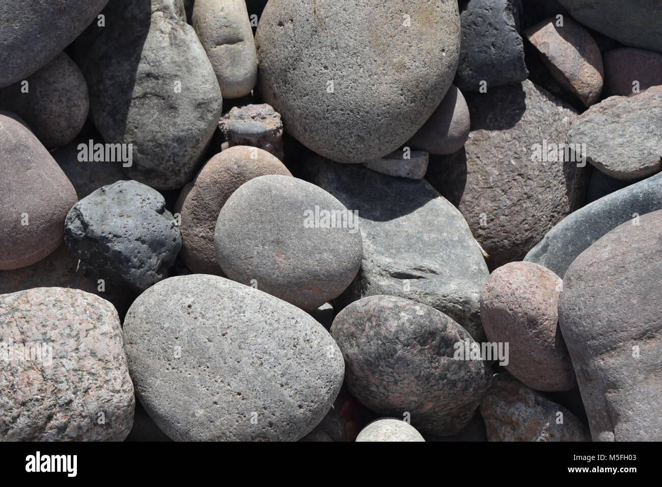 River rock abstract background Stock Photo - Alamy