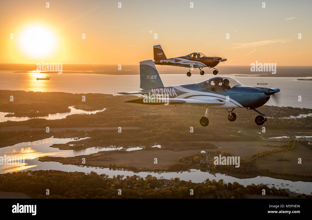 Two Vans RV-12 light sport aircrafts fly in formation together with the ...