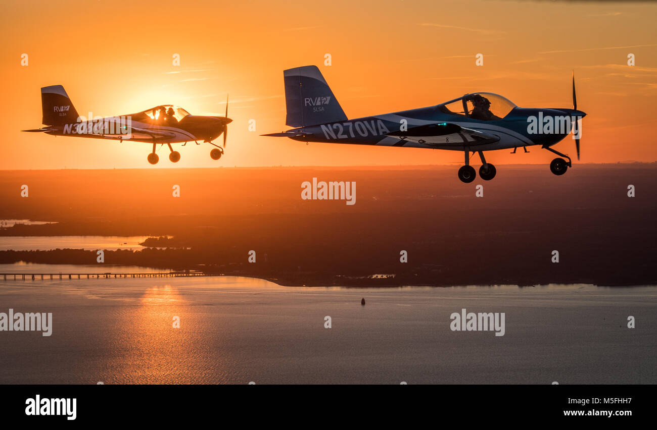 Two Vans RV-12 light sport aircrafts fly in formation together with the ...