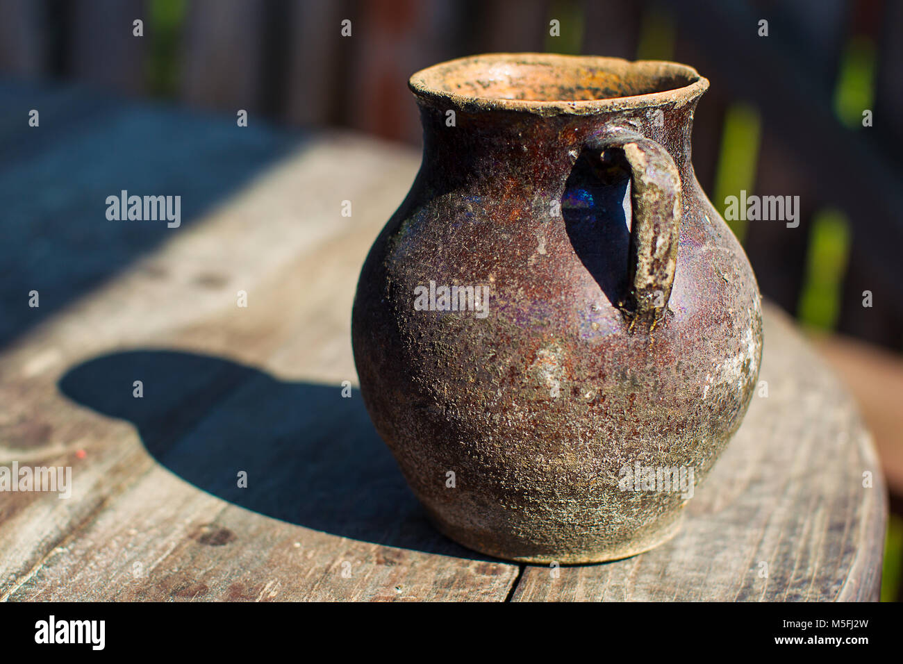 Old pitcher.An ancient decanter. Clay vessel. Ancient water tank Stock ...
