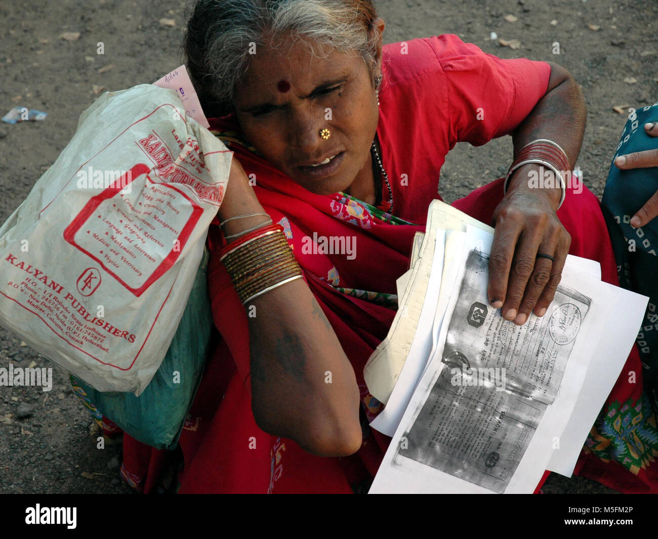 Woman indian documents paper hi-res stock photography and images - Alamy