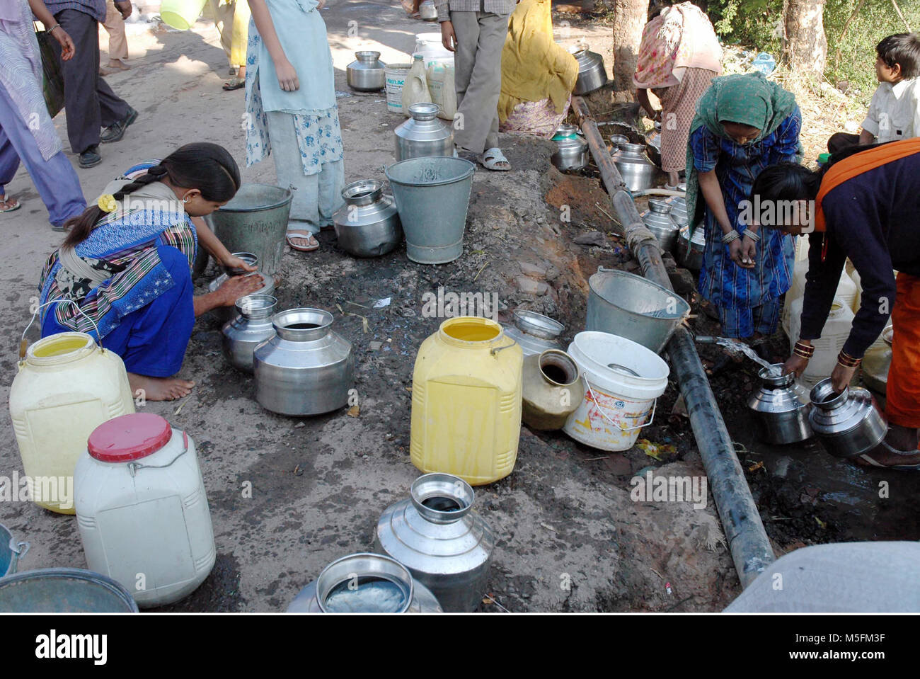 woman filling water pot, bhopal, madhya pradesh, India, Asia Stock ...
