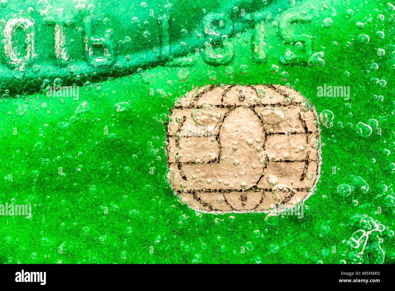 Closeup view ice frozen credit debit card Stock Photo - Alamy