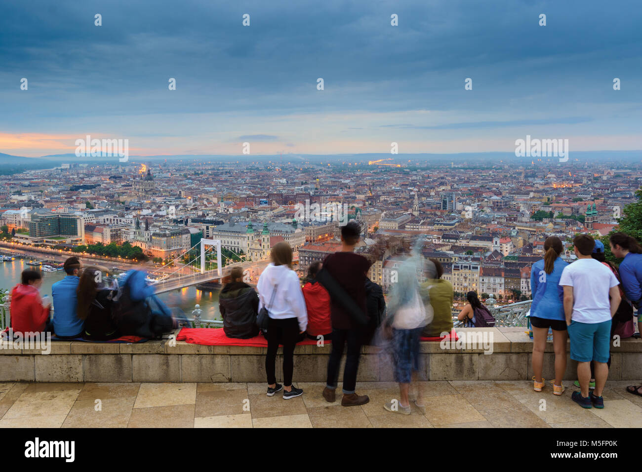 Group of people overlooking Budapest city from top viewing point on ...