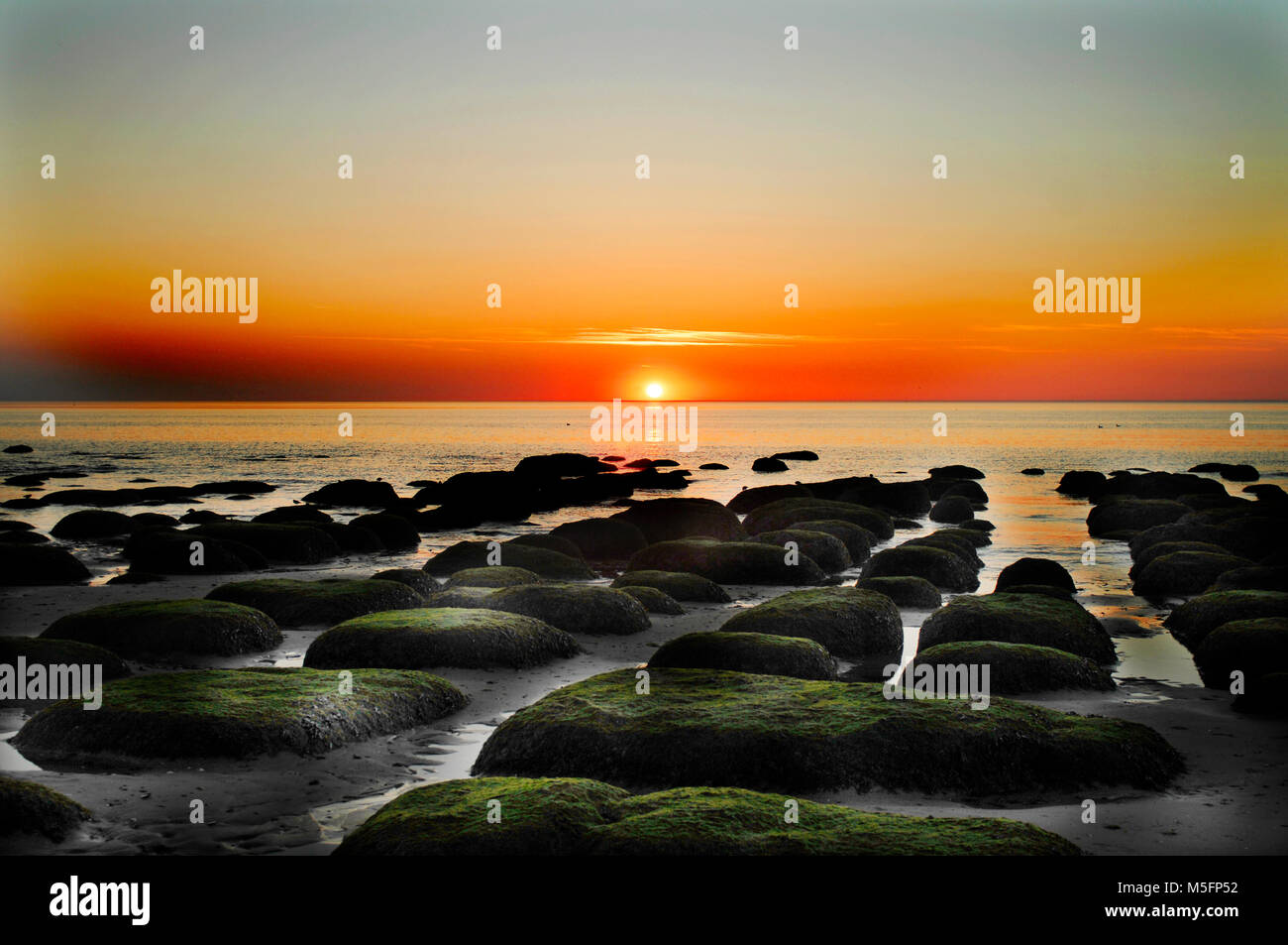 Hunstanton beach sunset Stock Photo - Alamy