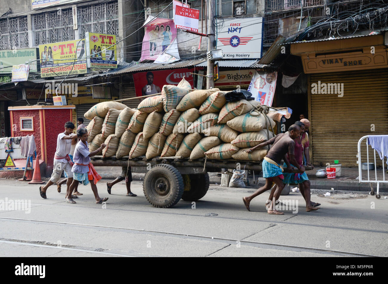 men pulling hand rickshaw, Kolkata, West Bengal, India, Asia Stock ...