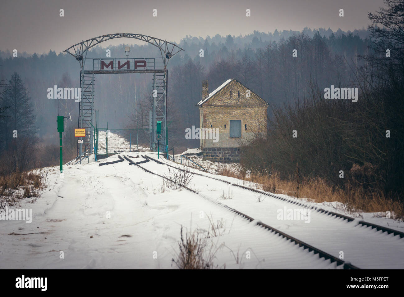 Gate with Russian word Mir (Peace) on former railway border crossing ...