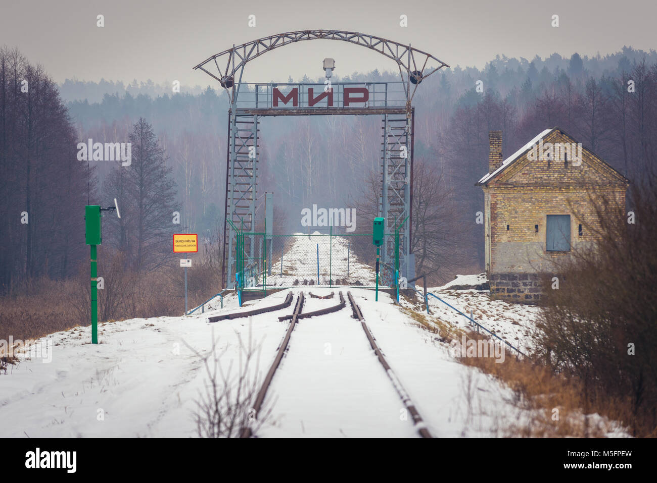 Gate with Russian word Mir (Peace) on former railway border crossing ...