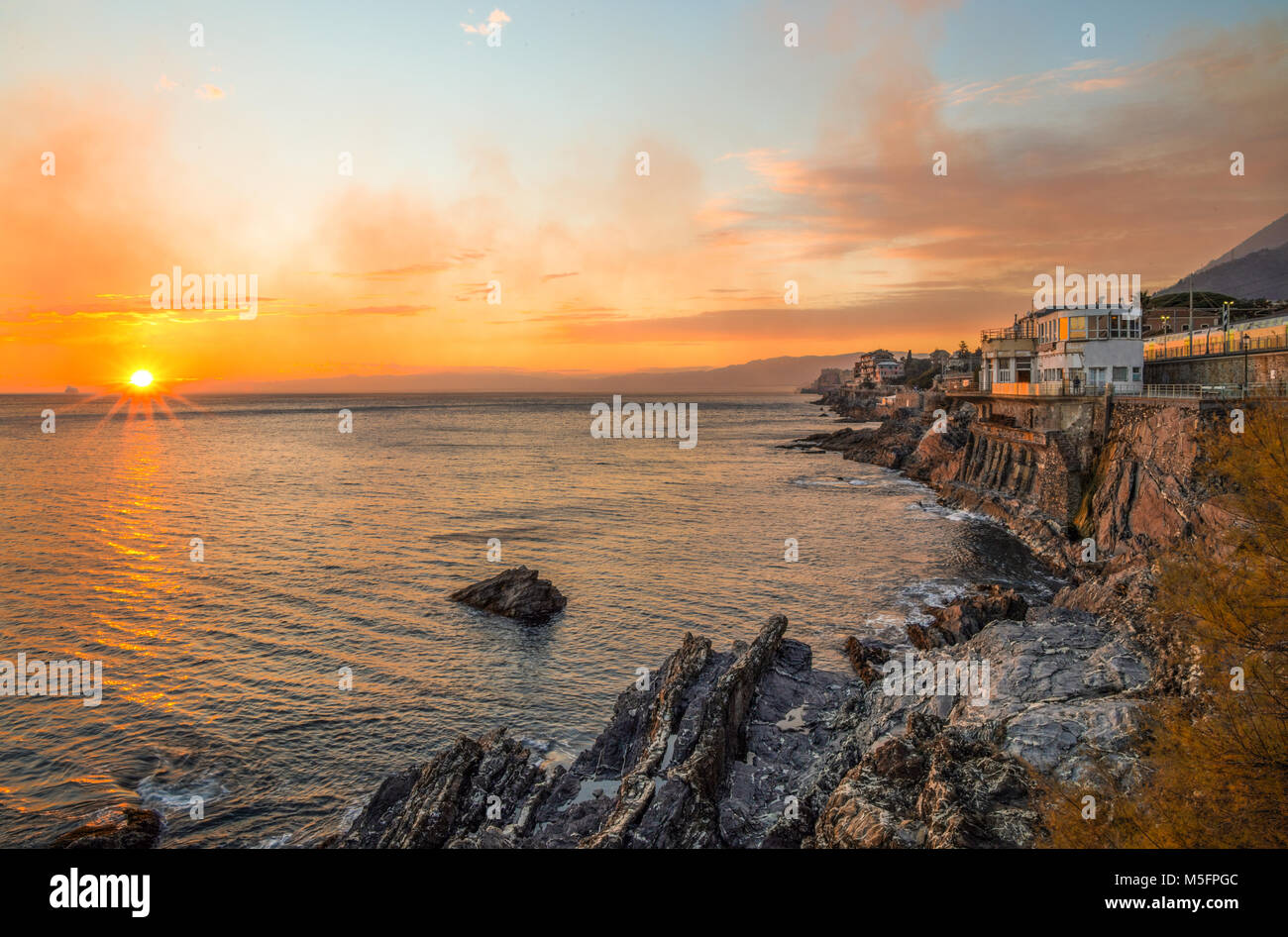 Sunset over the sea in Genoa (Genova) Nervi, italy Stock Photo - Alamy