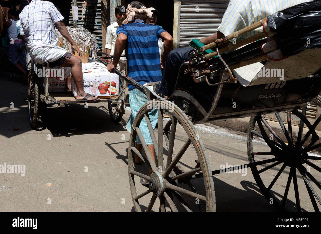 Indian Man Pulling Rickshaw Passenger Stock Photos & Indian Man Pulling ...