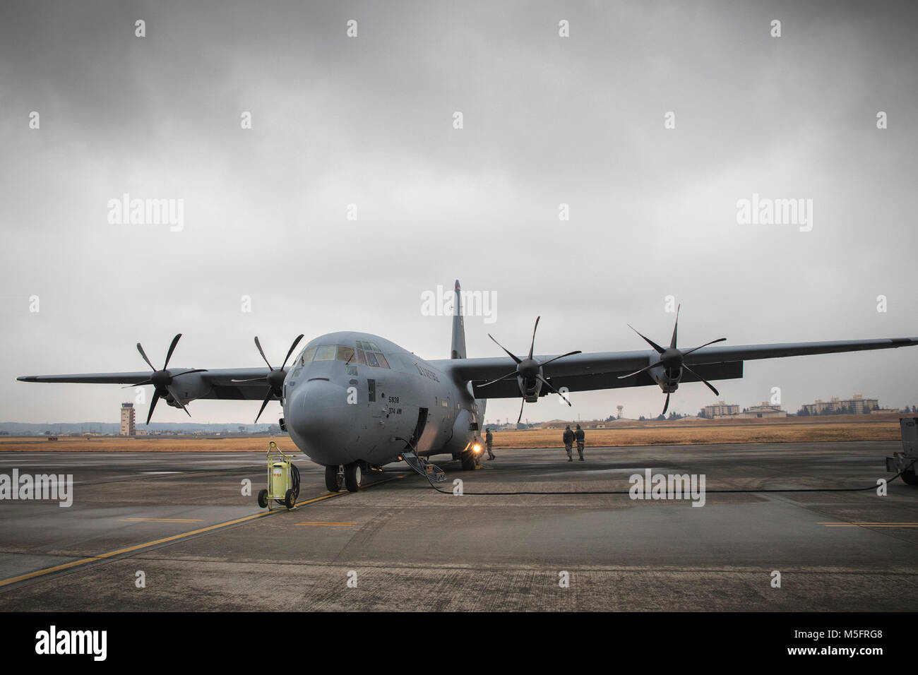 A C-130J Super Hercules sits on the flightline at Yokota Air Base ...