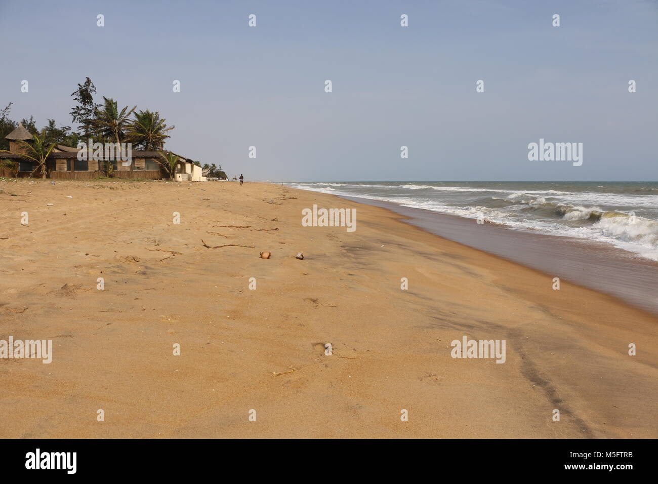 Beach in Benin with palm trees, wide beaches, fishermens houses, beach ...