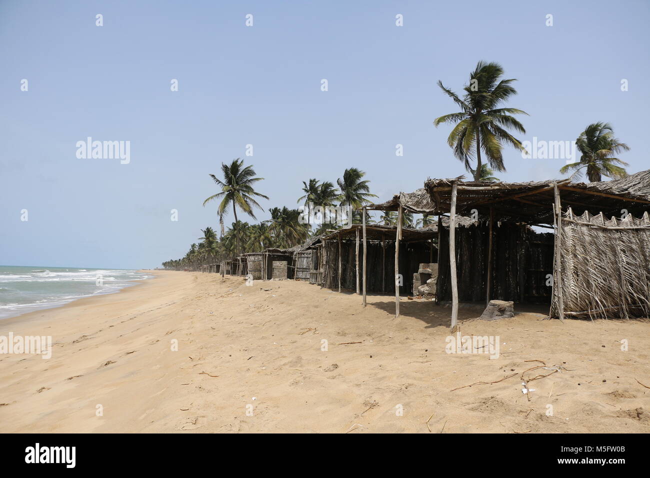 Beach in Benin with palm trees, wide beaches, fishermens houses, beach ...