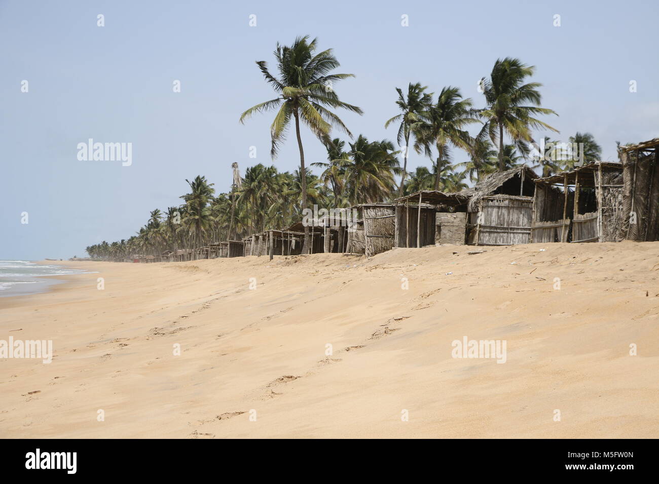 Beach in Benin with palm trees, wide beaches, fishermens houses, beach ...
