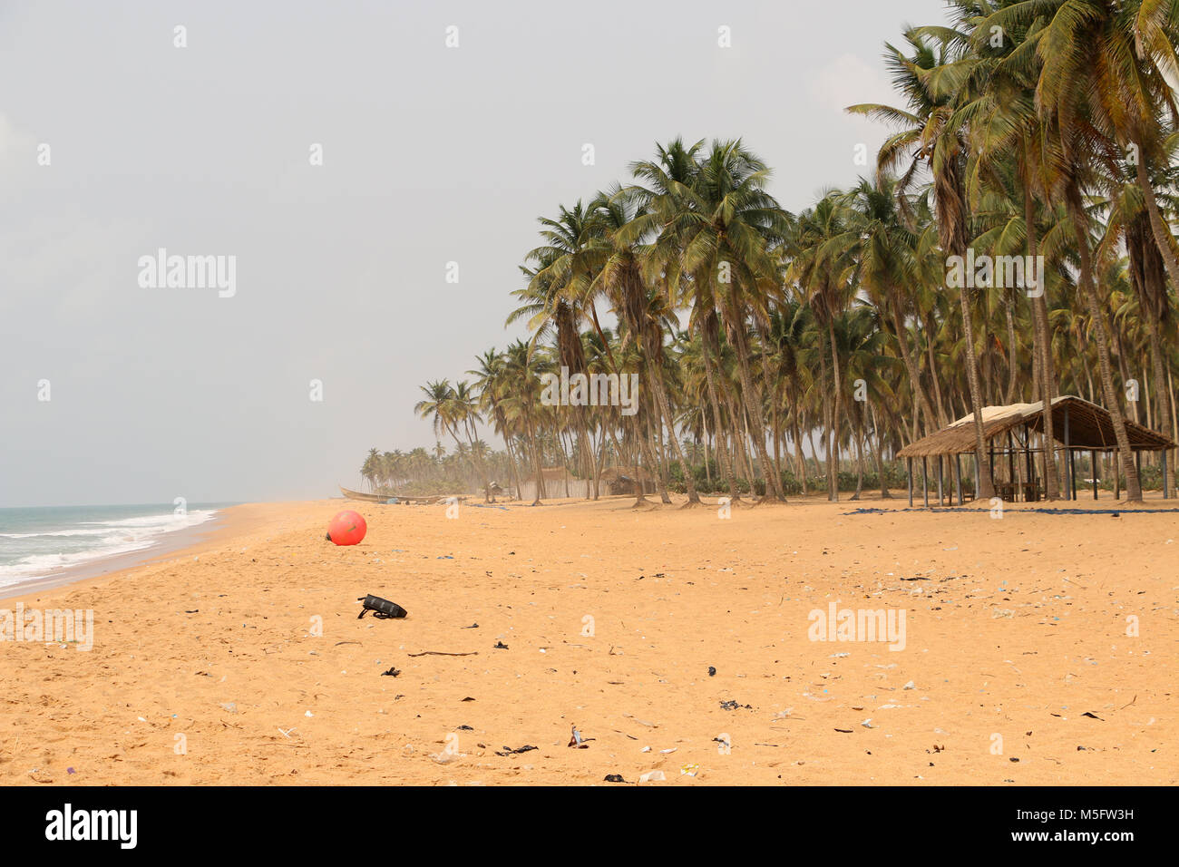 Beach in Benin with palm trees, wide beaches, fishermens houses, beach ...